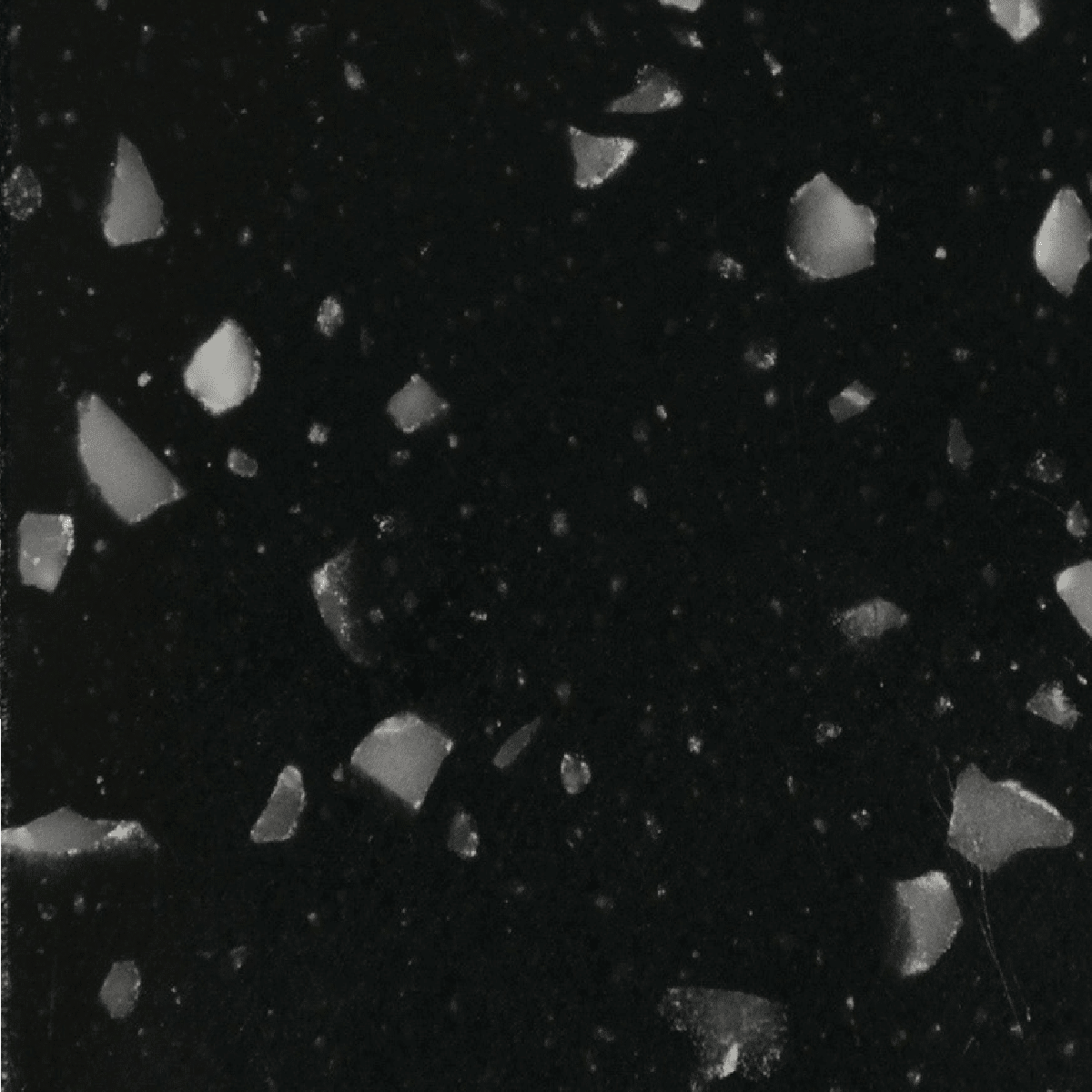 Staron Pebble Ebony Solid Surface | Black Terrazzo